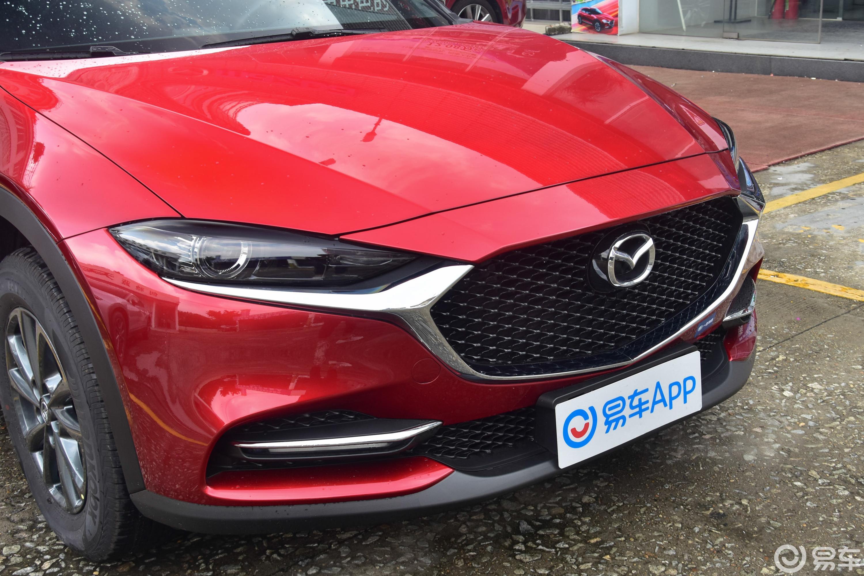 【马自达CX-42.0L 手自一体 两驱 蓝天青春版前格栅侧俯拍图片-汽车图片大全】-易车