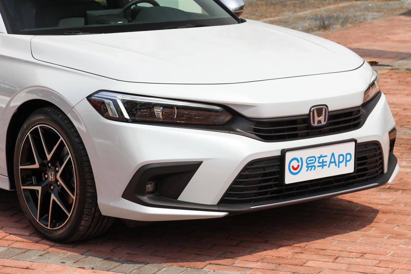 【思域e:HEV 2.0L E-CVT劲速版前格栅侧俯拍图片-汽车图片大全】-易车