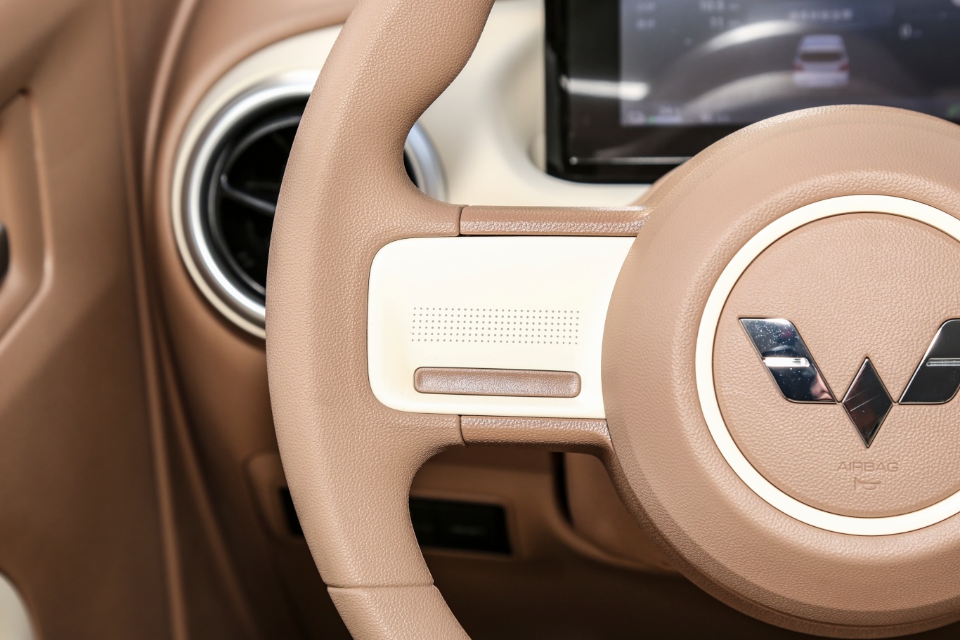 【宏光MINIEV四门版 205km 臻享＋款左侧方向盘功能按键图片-汽车图片大全】-易车